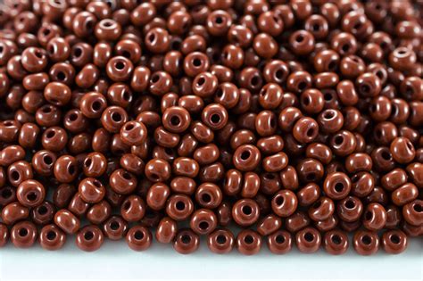 Купить Бисер чешский PRECIOSA круглый 6/0 13600 коричневый непрозрачный ...