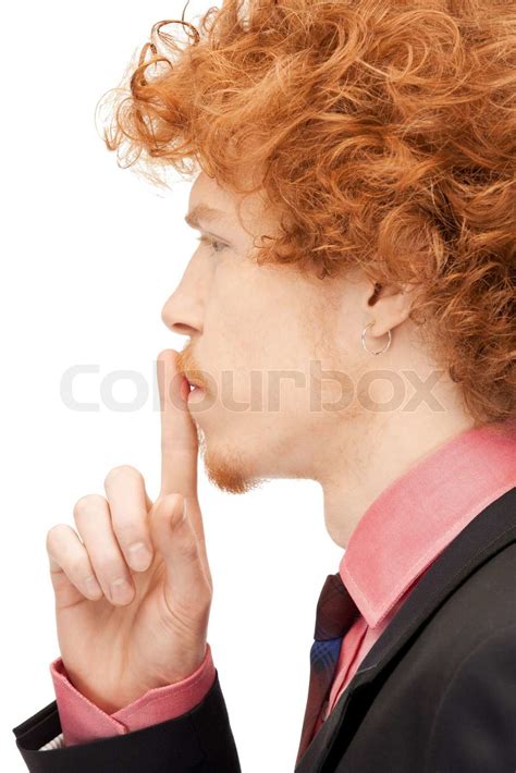 helles Bild der schöne Mann mit dem Finger auf die Lippen | Stock Bild ...