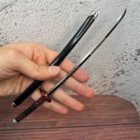 Tanjiro Metalna Katana 26cm v2 | Dattebayo Shop