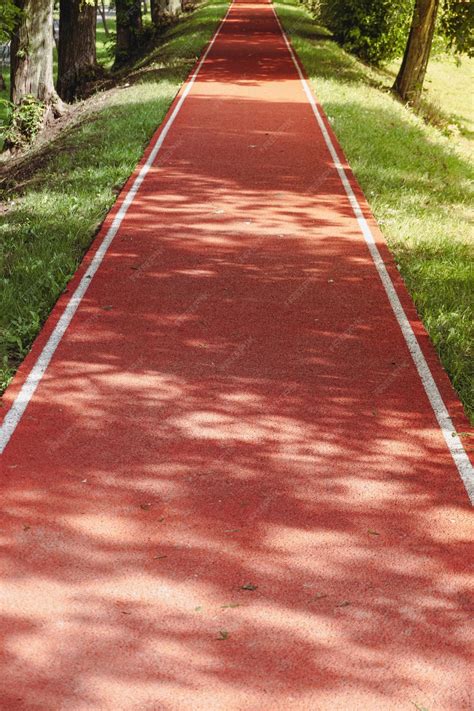 Premium Photo | Track and field park. healthy sport. jogging track at ...
