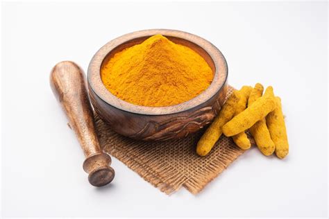 Turmeric powder indian spice 16758993 Stock Photo at Vecteezy