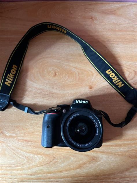 Nikon D5300 (with kit lens, SD card, tripod, battery, charger ...