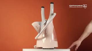 Характеристики Отпариватель напольный Philips GC552/40, розовый / белый ...