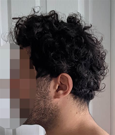 How do you tame such hair everyday? Currently growing it and it's ...