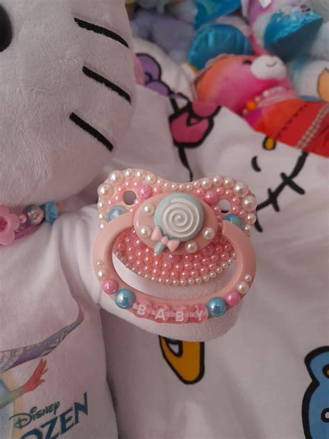 I decorated my first paci :3 I think it didn't turn out too bad at least kitty likes it uwu : r ...