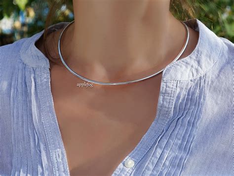 Серебряная гривна на шею купить