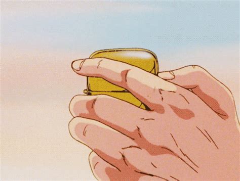 Гиф анимация В руке зажигалка, аниме Maison Ikkoku