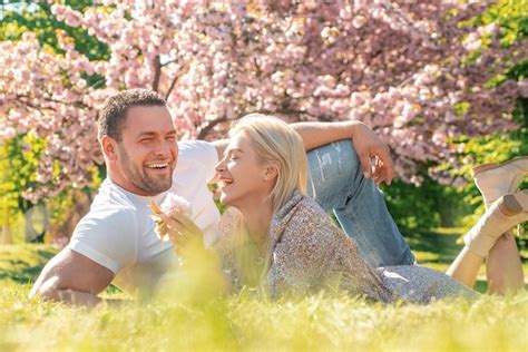 Premium Photo | Spring romantic couple in love looking at each other ...