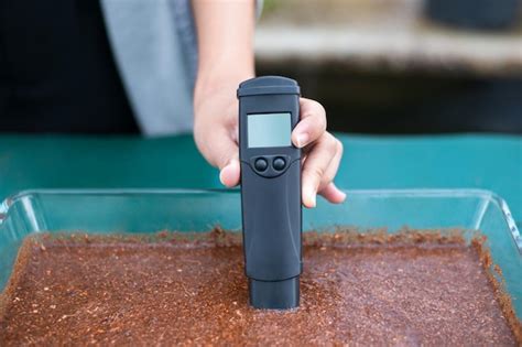 Premium Photo | The ec meter measures the water