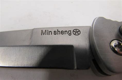 Sold Price: MIN SHENG AUTOMATIC OPEN LOCKING KNIFE - Invalid date EST