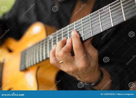 Detail of Guitarist Playing Seven String Guitar Stock Photo - Image of ...
