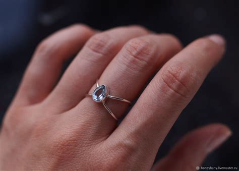 Серебряное кольцо Бесконечность с голубым топазом каплей в интернет ...