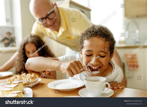 Father Looking Boy Drinking Hot Chocolate Stock Photo 2215467267 ...