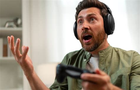 Free Photo | Medium shot man playing videogames
