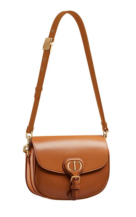 Сумка Dior, пуховик Moncler и еще 11 вещей, которые нужно купить сейчас ...