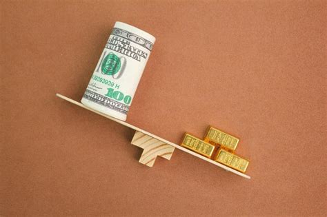 Premium Photo | The balance of money and gold turns out that gold is ...