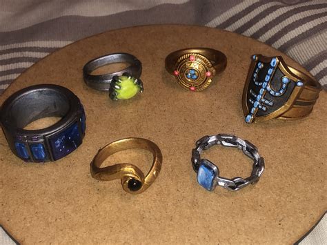 [OC] I printed and painted some prop rings based on the magic items ...