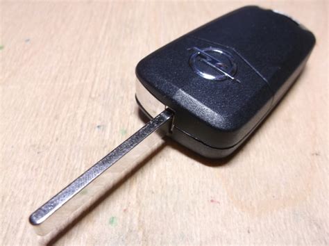 Opel Corsa D выкидной чип ключ Delphi G1-AM433TX на Opel Corsa D. | 1 ...