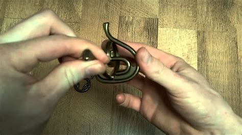 Hanayama Enigma Puzzle Solution (Quick and Easy) - YouTube