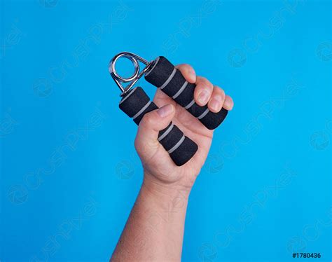 Black espander in female hand - stock photo 1780436 | Crushpixel