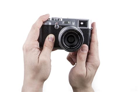 Camera In Hand Free Stock Photo - Public Domain Pictures